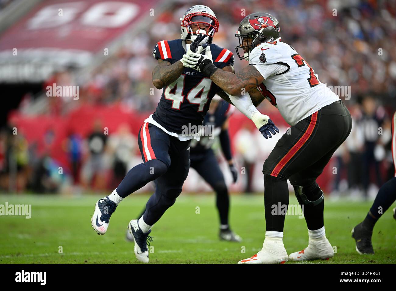 New England Patriots linebacker K'Lavon Chaisson (44) works against ...