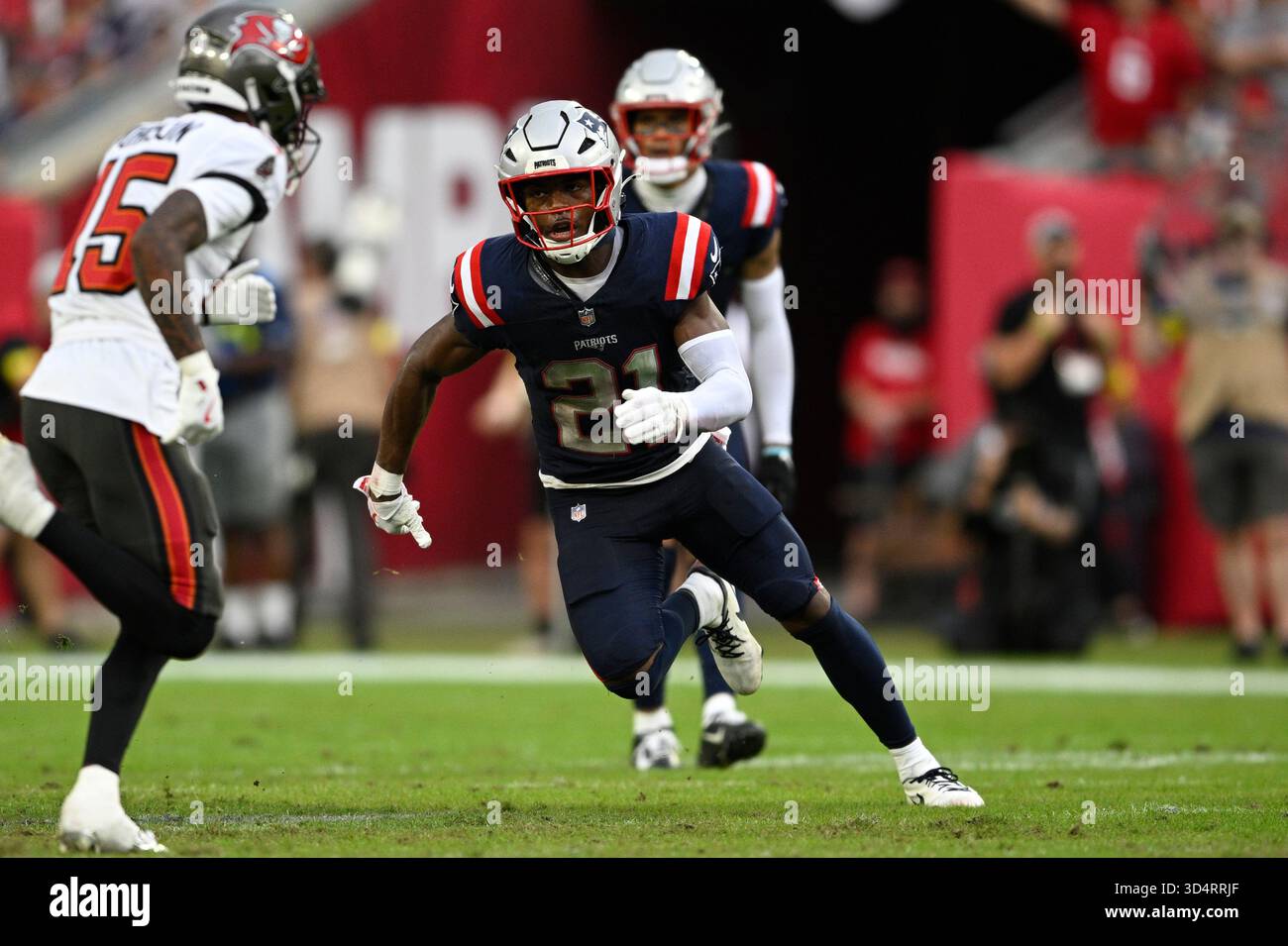 New England Patriots safety Jaylinn Hawkins (21) follows a play against ...