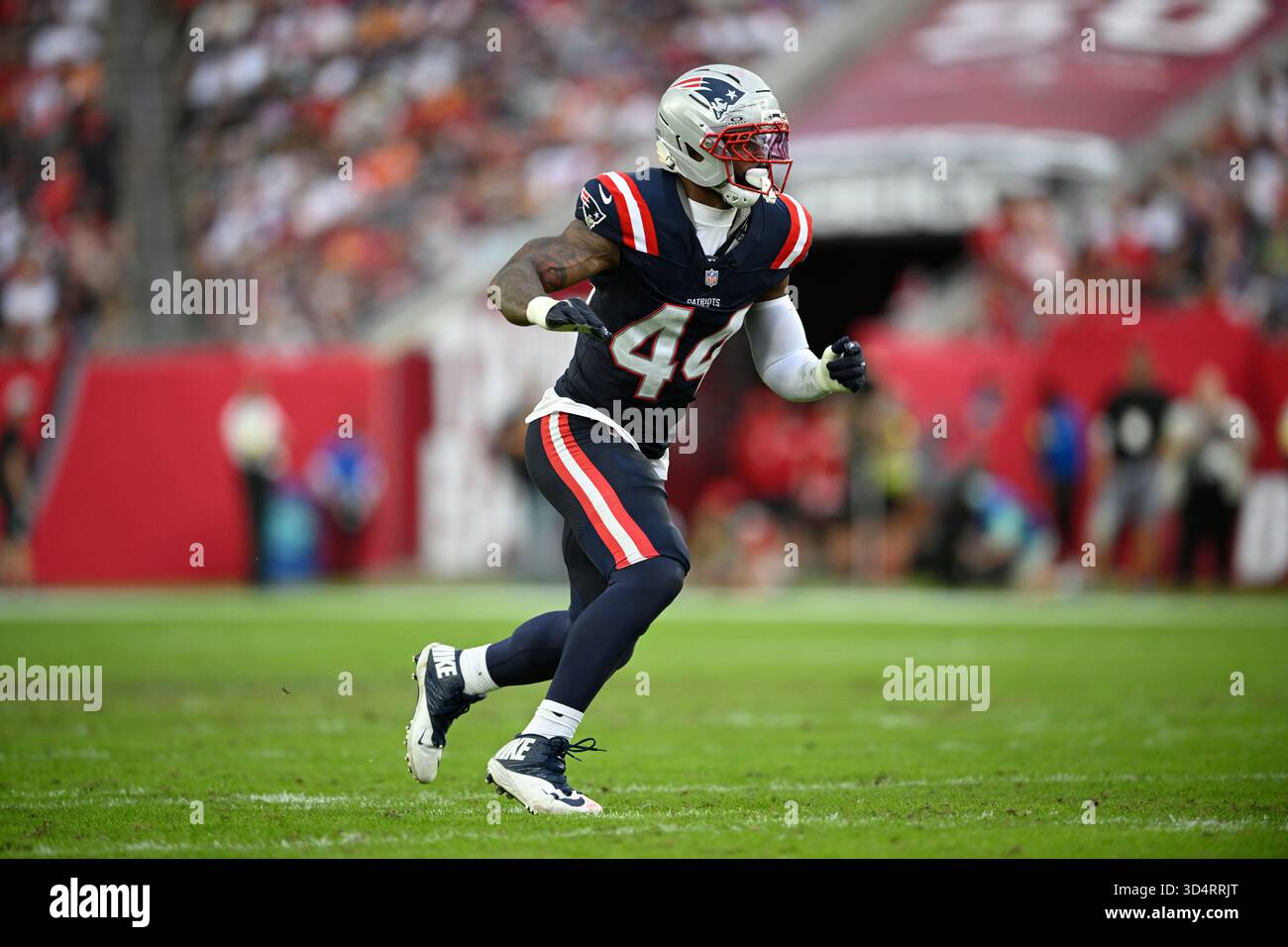 New England Patriots linebacker K'Lavon Chaisson (44) follows a play ...