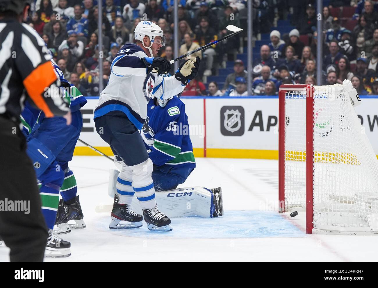 Winnipeg Jets' Jonathan Toews, front, celebrates his goal against ...