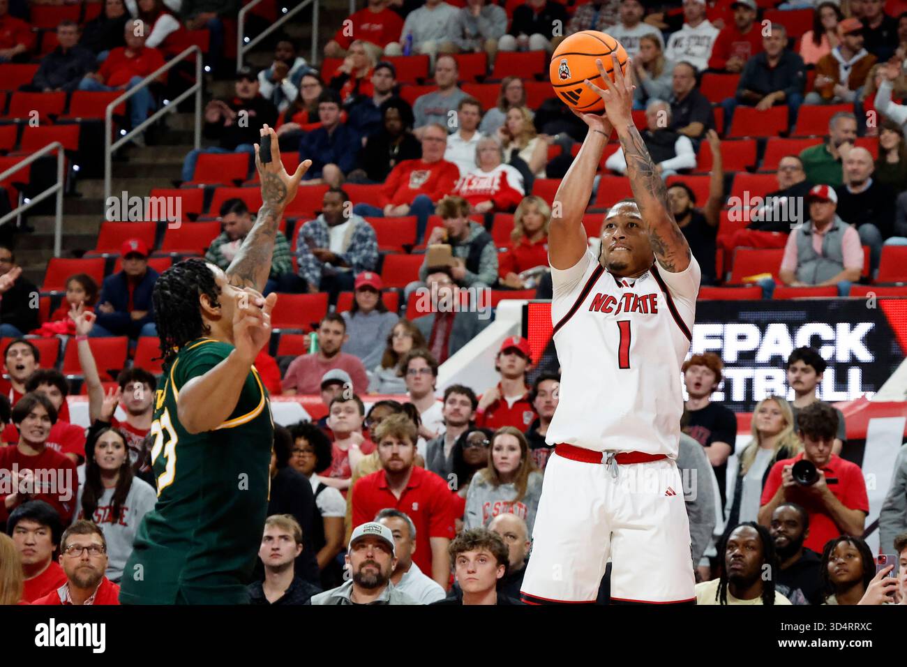 North Carolina State's Darrion Williams (1) shoots the ball over UAB's ...