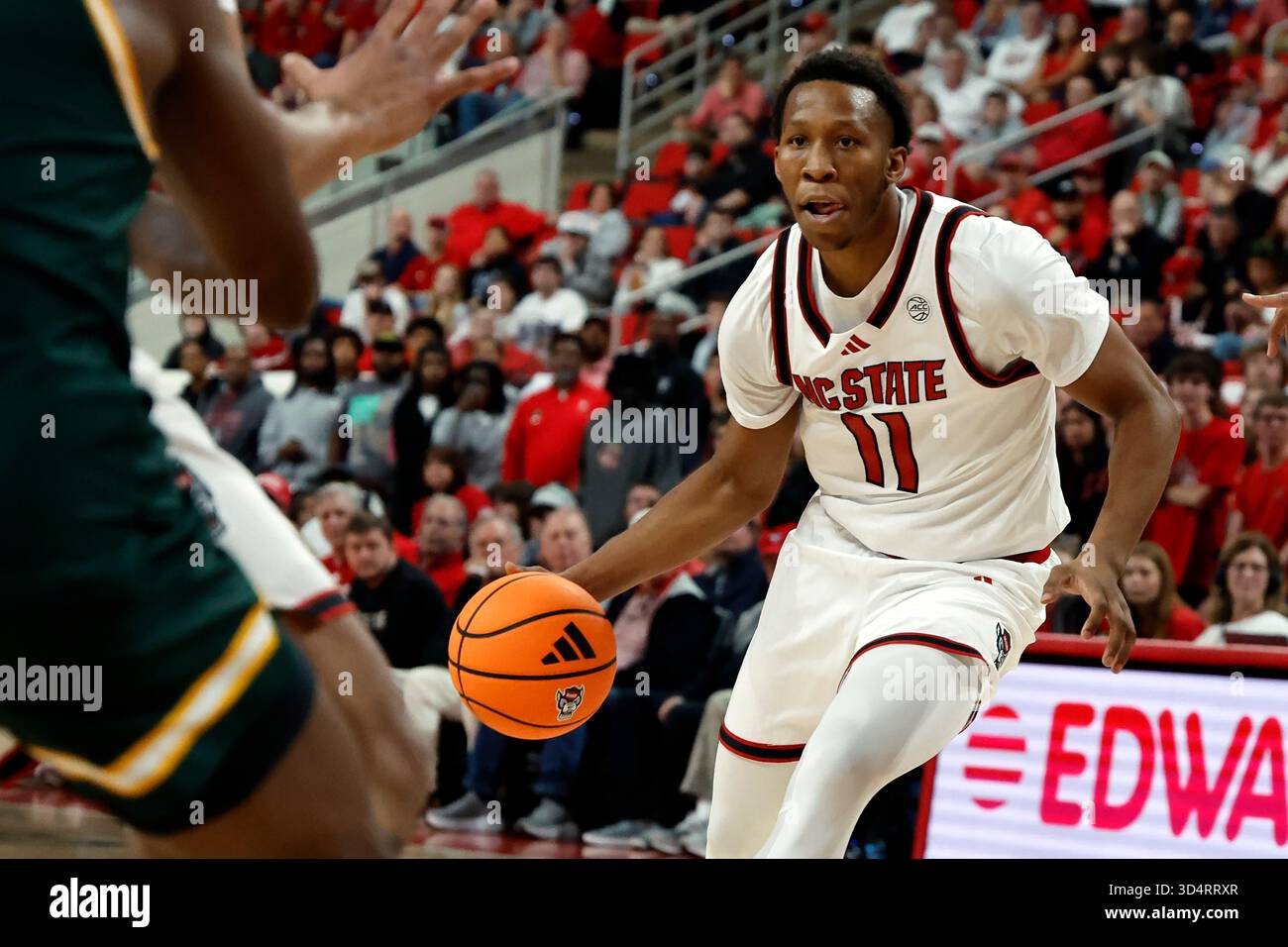 North Carolina State's Quadir Copeland (11) looks to pass the ball ...