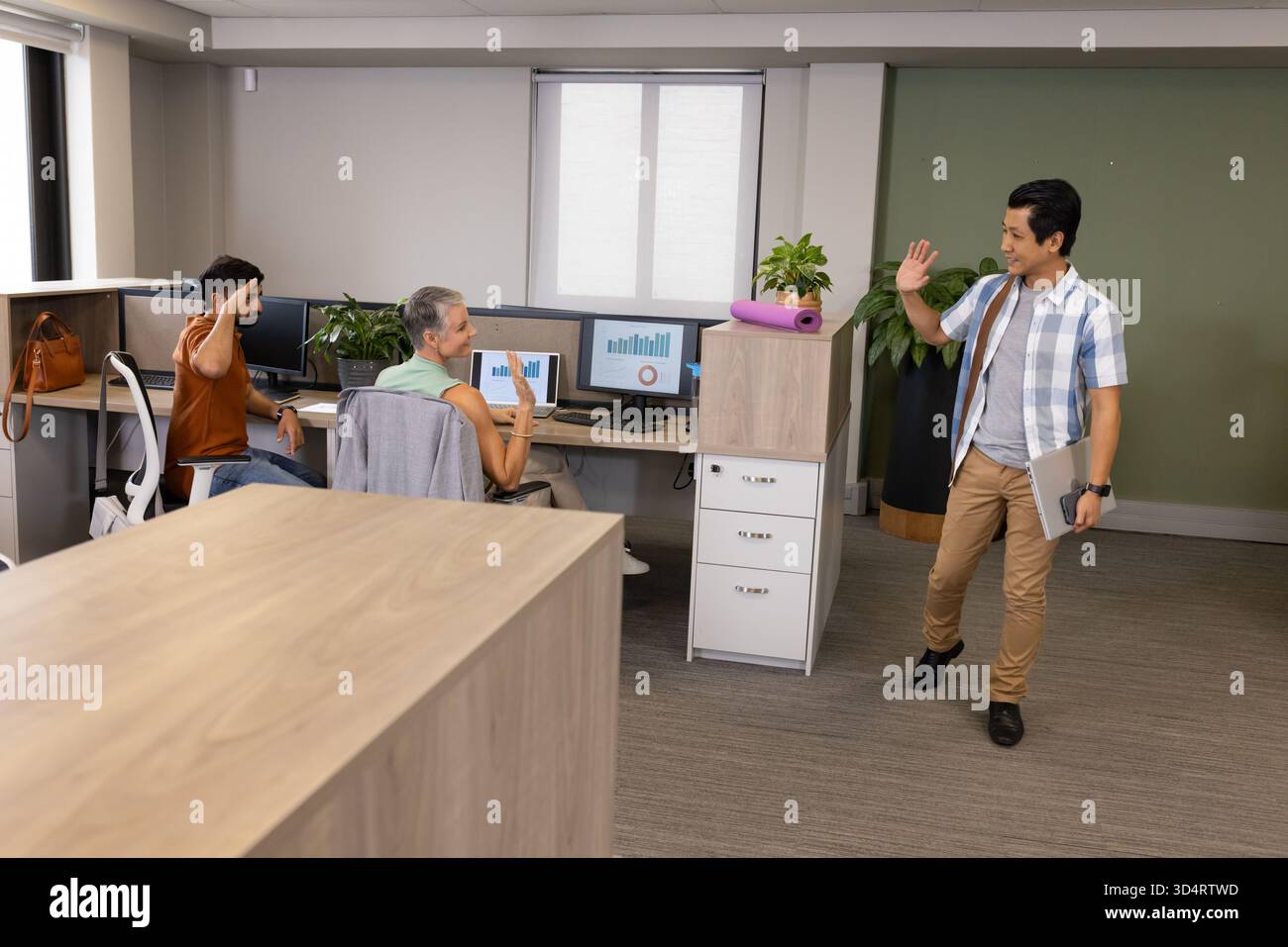 Adult indian coworker entering office hi-res stock photography and ...