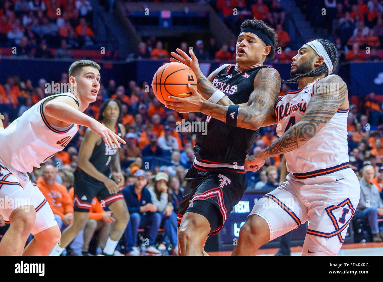 Texas Tech forward LeJuan Watts drives to the basket between David ...