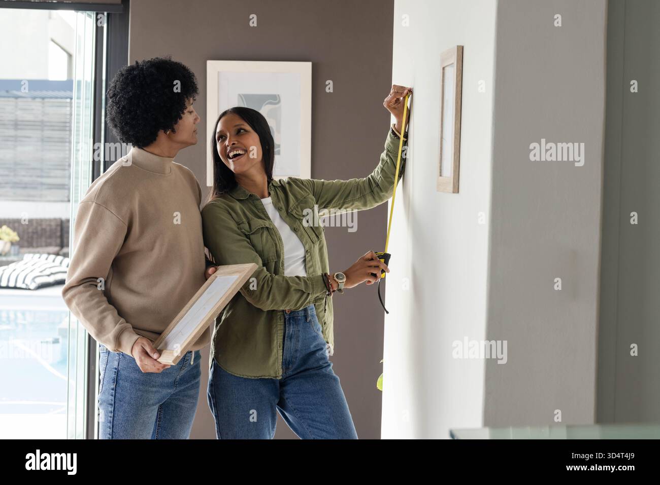Measuring wall placement diverse hi-res stock photography and images ...
