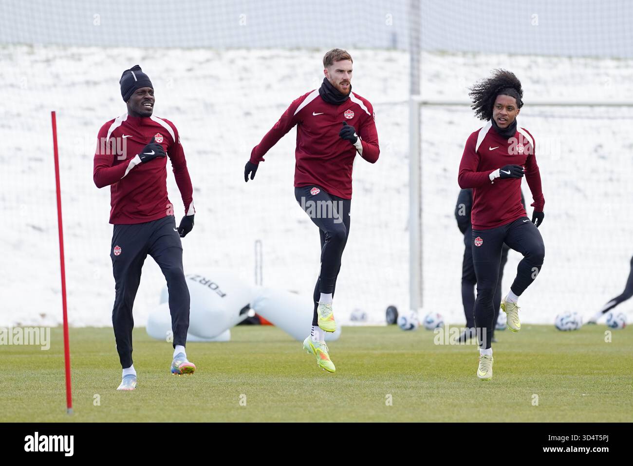 Tani Oluwaseyi #12 of Canada, Joel Waterman #5 of Canada and Jayden ...