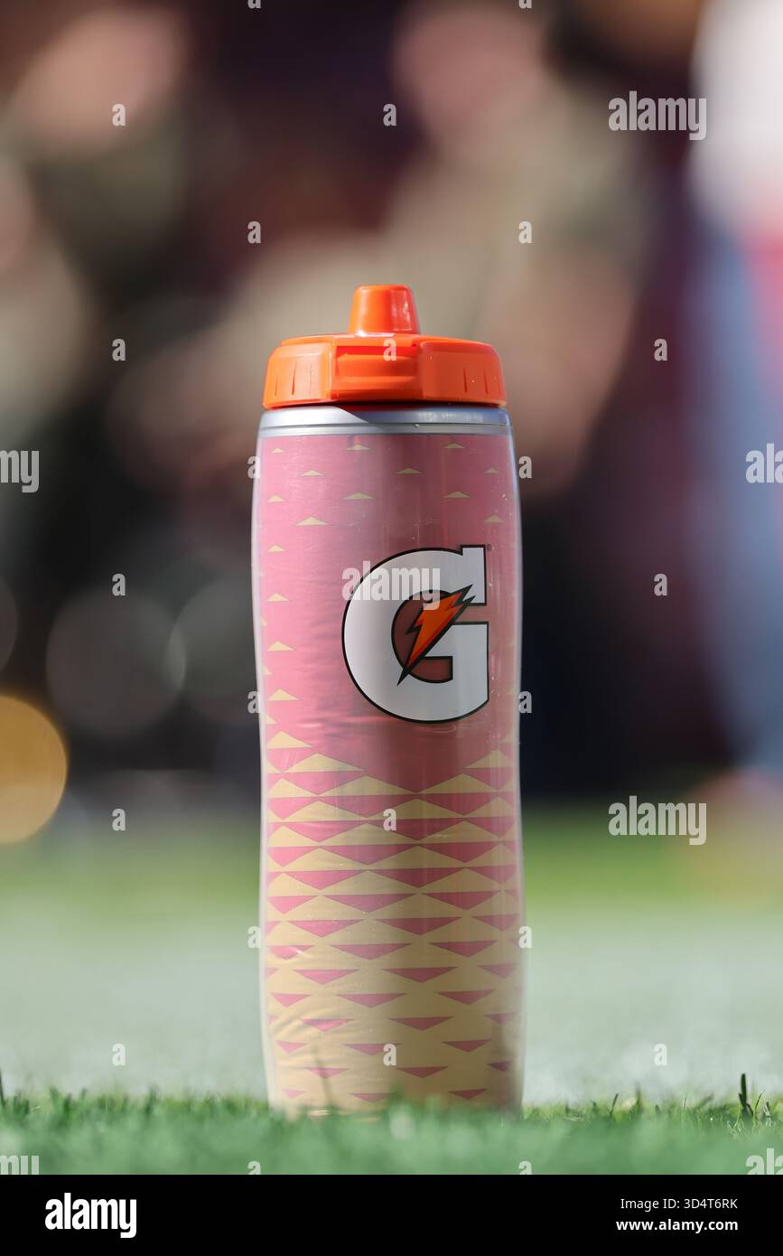 A Gatorade bottle sits on the field during an NFL football game between ...