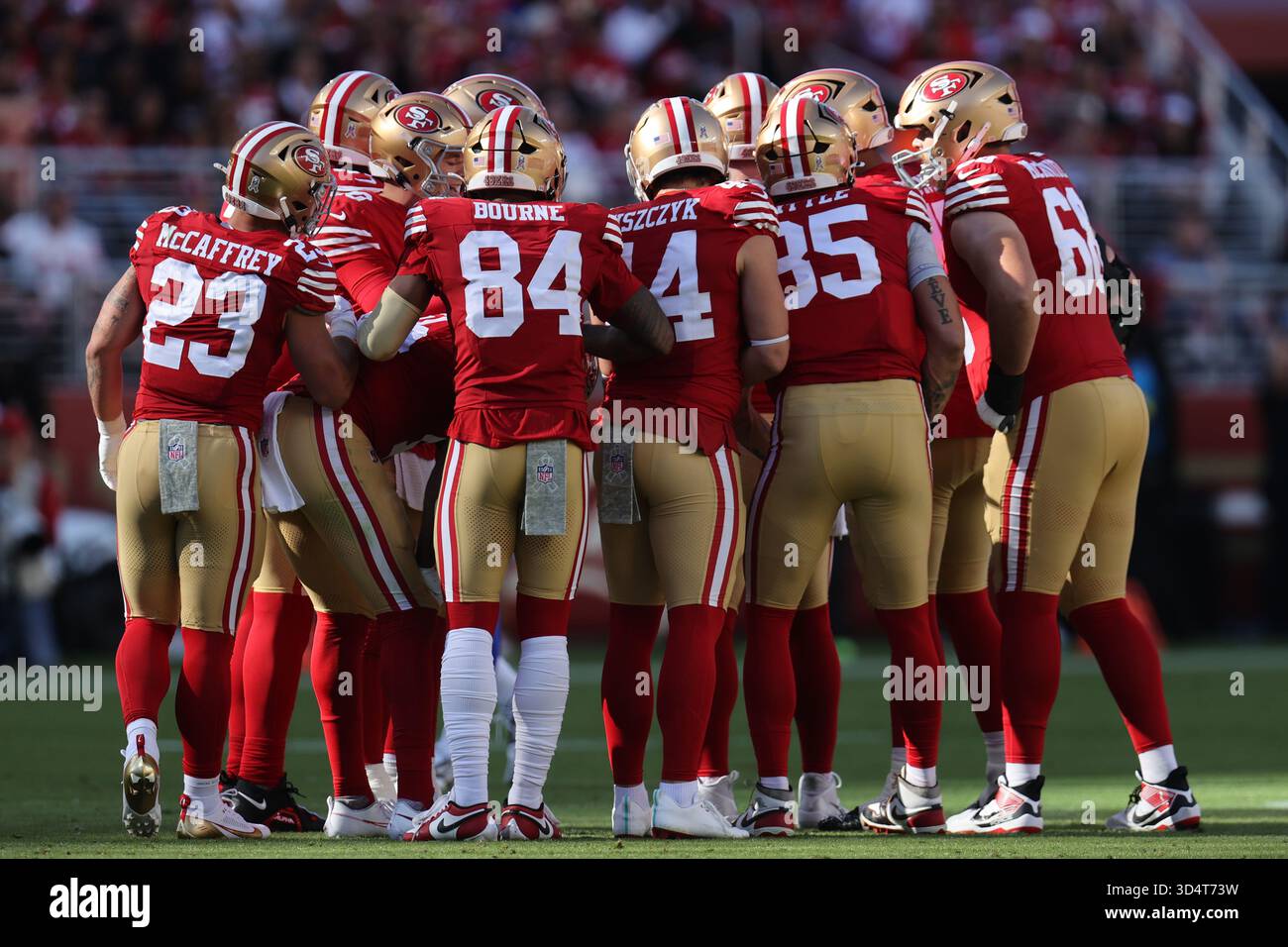 The San Francisco 49ers offense huddles in the first half during an NFL ...