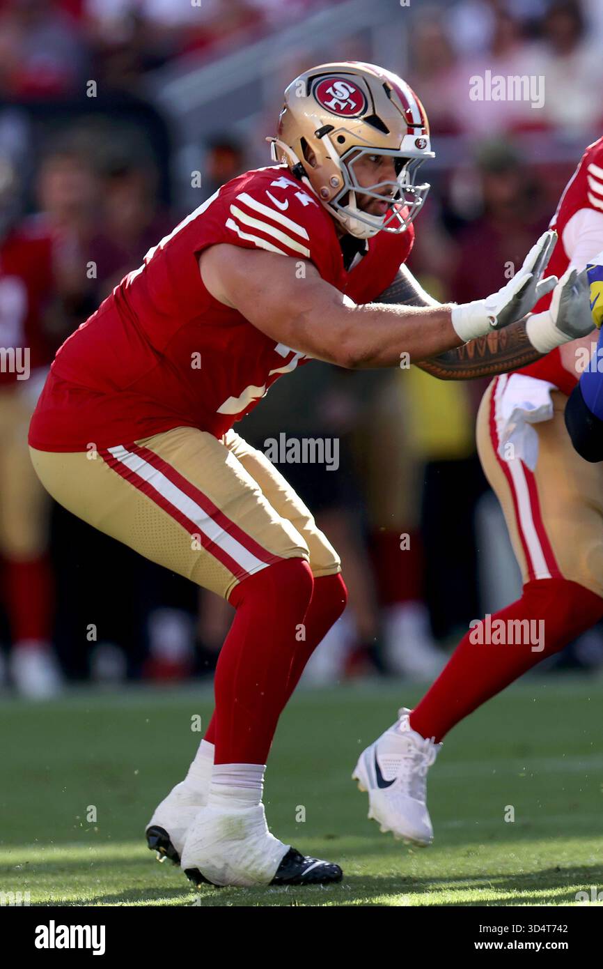 San Francisco 49ers offensive tackle Dominick Puni (77) blocks during ...