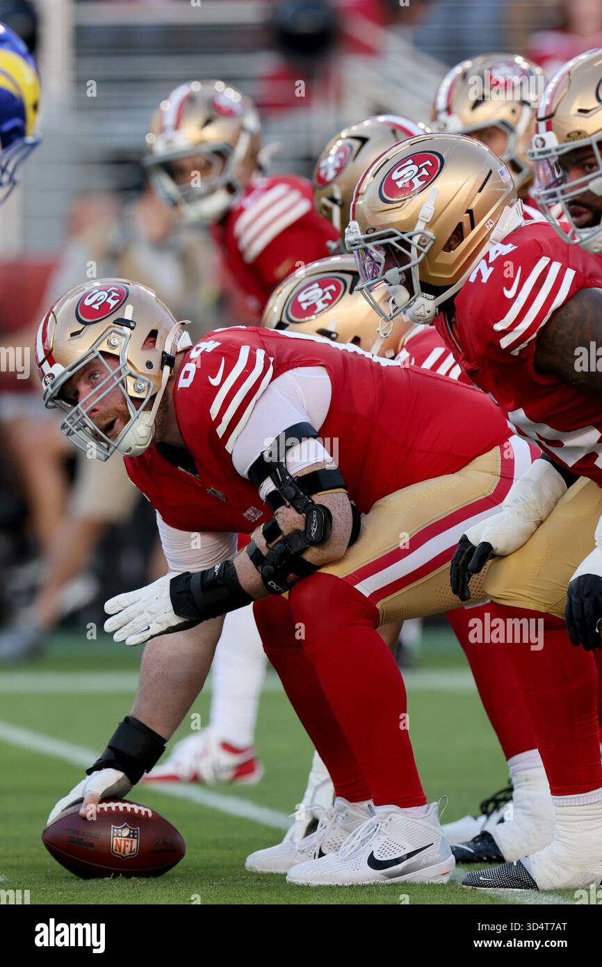 San Francisco 49ers center Jake Brendel (64) hikes the ball during an ...