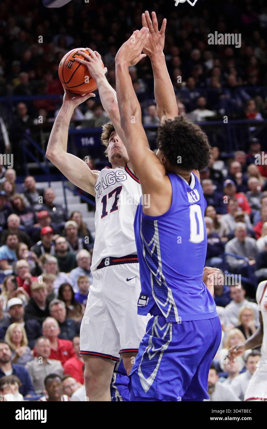 Gonzaga guard Mario Saint-Supery (17) shoots while pressured by ...