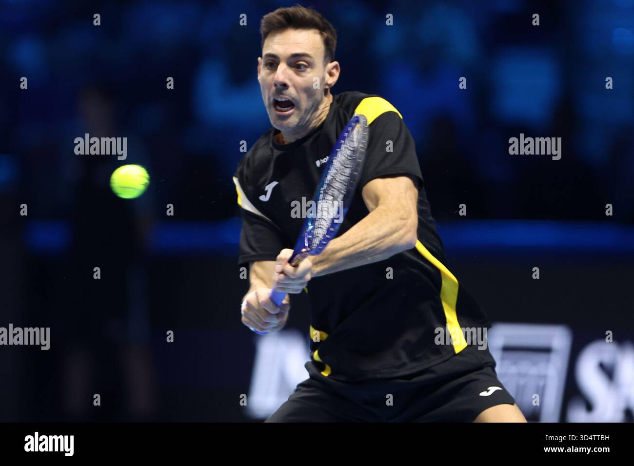 Marcel Granollers of Spain in action during the Round Robin doubles ...