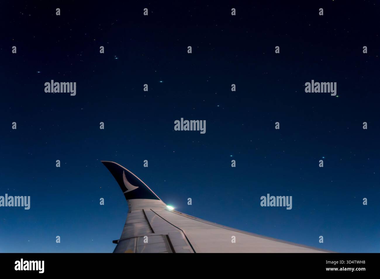 Cathay Pacific Airbus A350 winglet under clear night sky with stars and ...