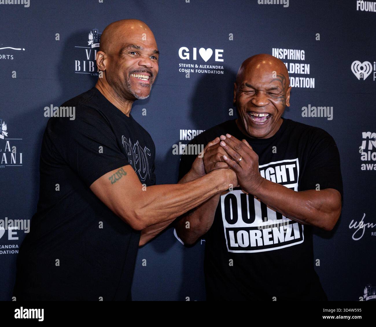 Darryl 'DMC' McDaniels (L) and Mike Tyson attend The Inaugural Not ...