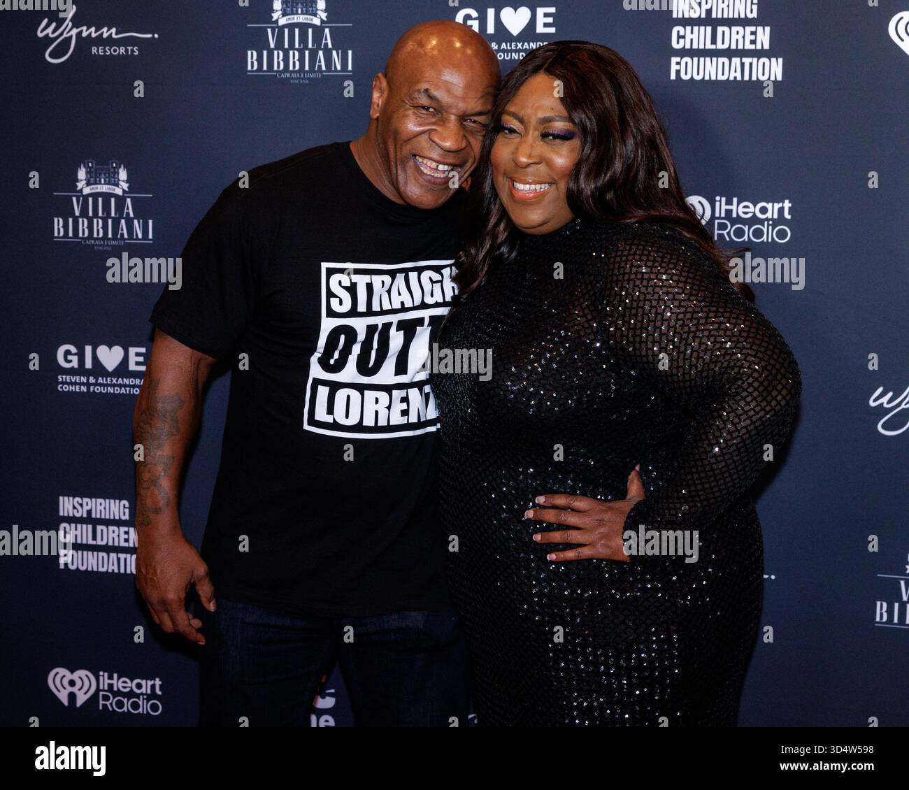 Mike Tyson (L) and Loni Love attend The Inaugural Not Alone Awards ...