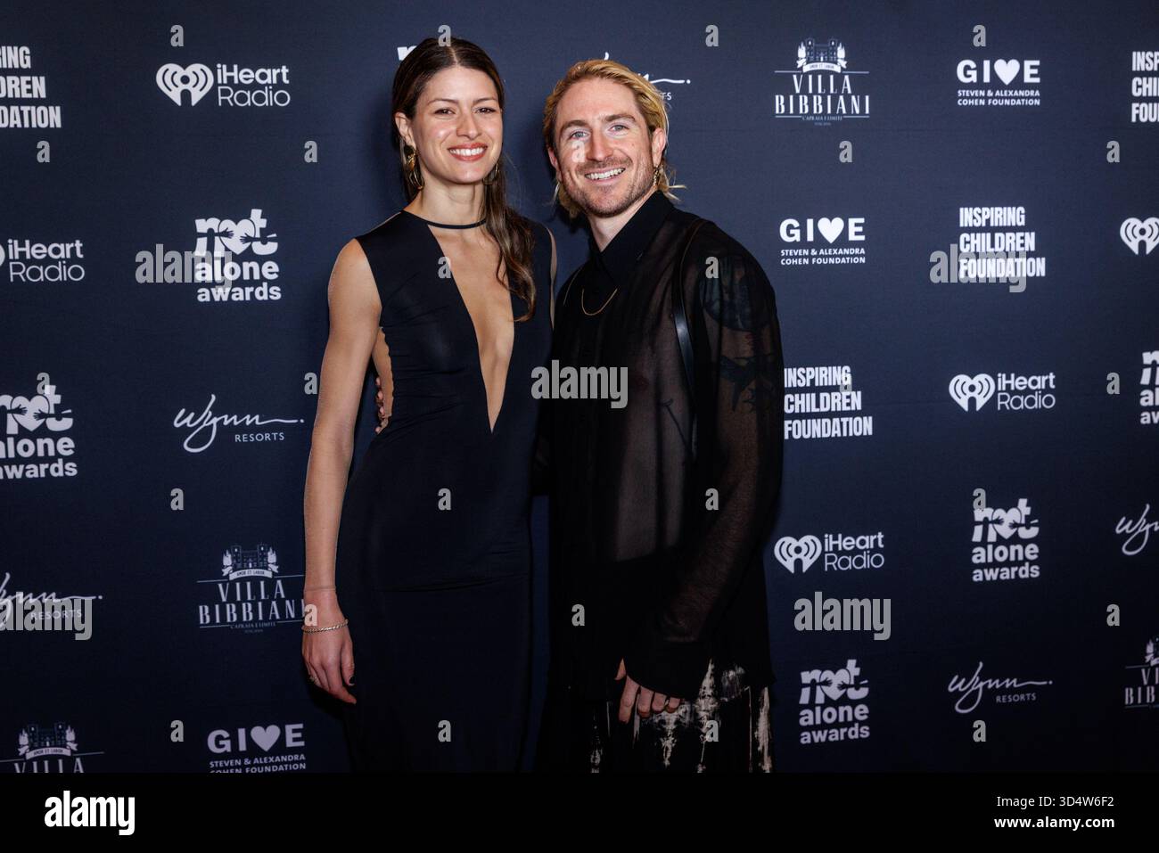 Karlie Dean (L) and Nicholas Petricca attend The Inaugural Not Alone ...