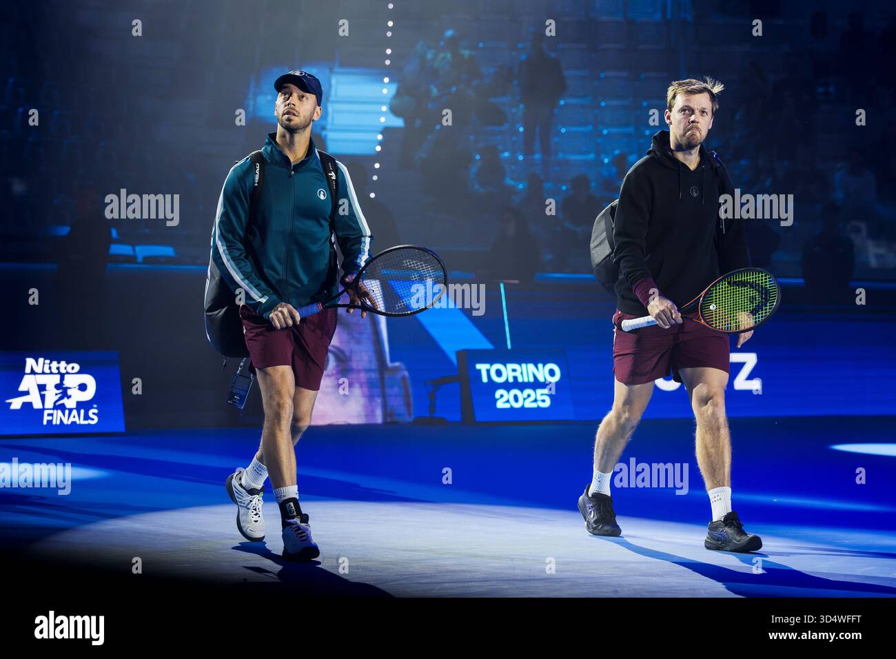 Kevin Krawietz (R) and Tim Putz of Germany walk put prior to their ...