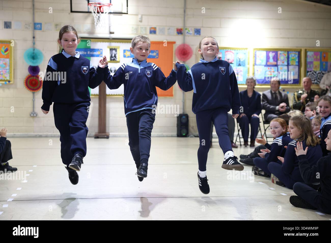President Catherine Connolly watches pupils perform Irish dancing ...