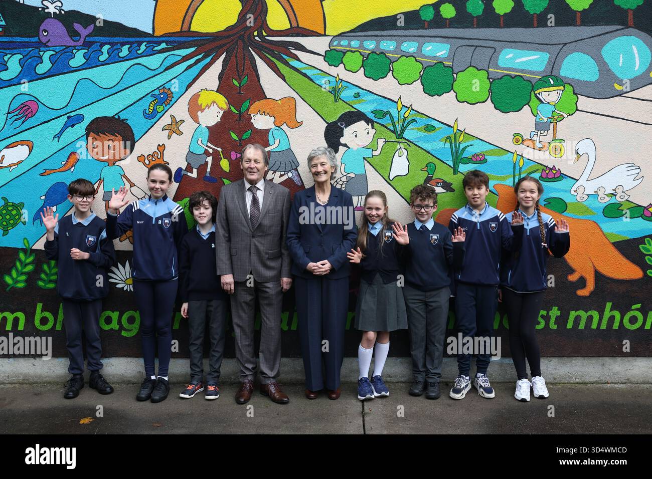 President Catherine Connolly with pupils during a visit to Gaelscoil ...