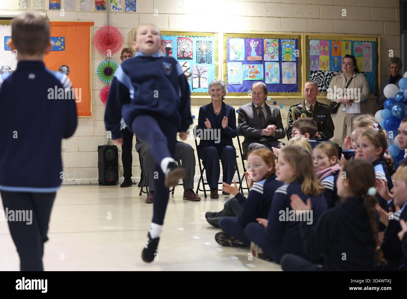 President Catherine Connolly watches pupils perform Irish dancing ...