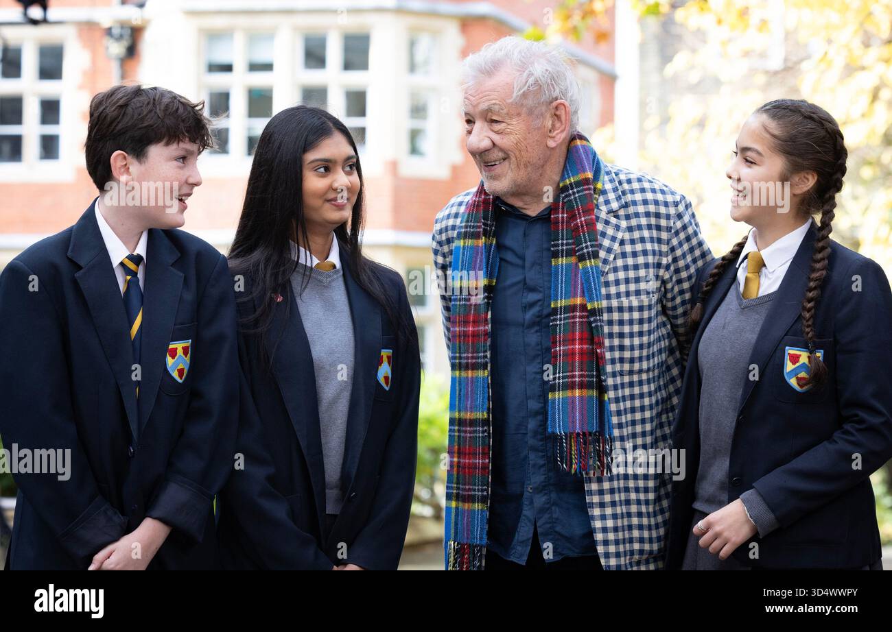 EDITORIAL USE ONLY Sir Ian McKellen (centre), with students from ...