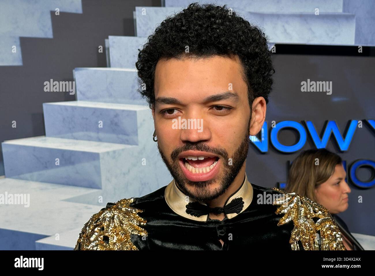 Justice Smith speaks with the media at the premiere of "Now You See Me ...