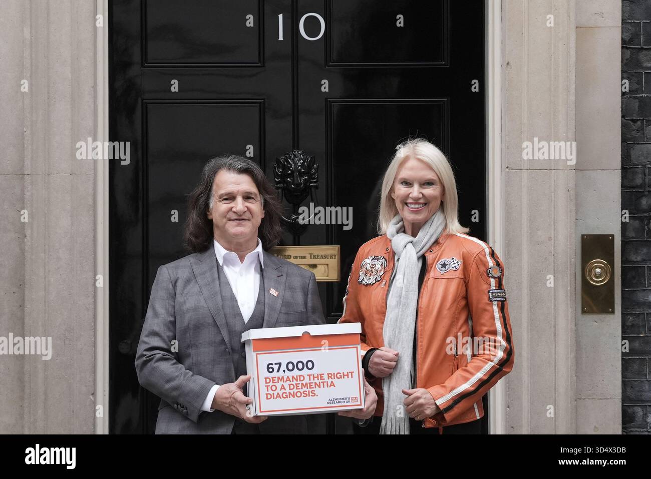 Scott Mitchell and Anneka Rice hand in a petition for Alzheimer's ...