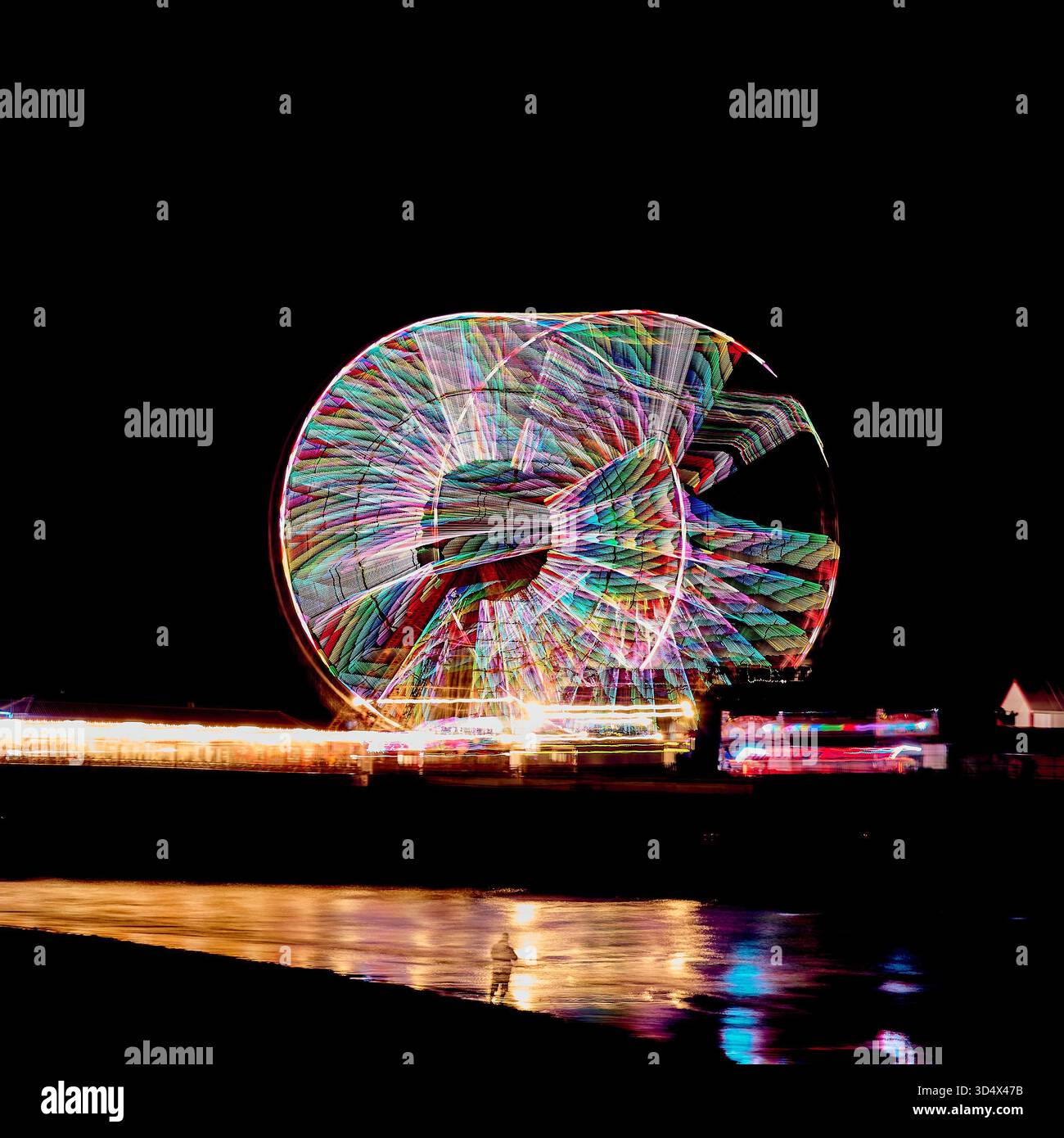 Rotating ferris wheel copy hi-res stock photography and images - Alamy