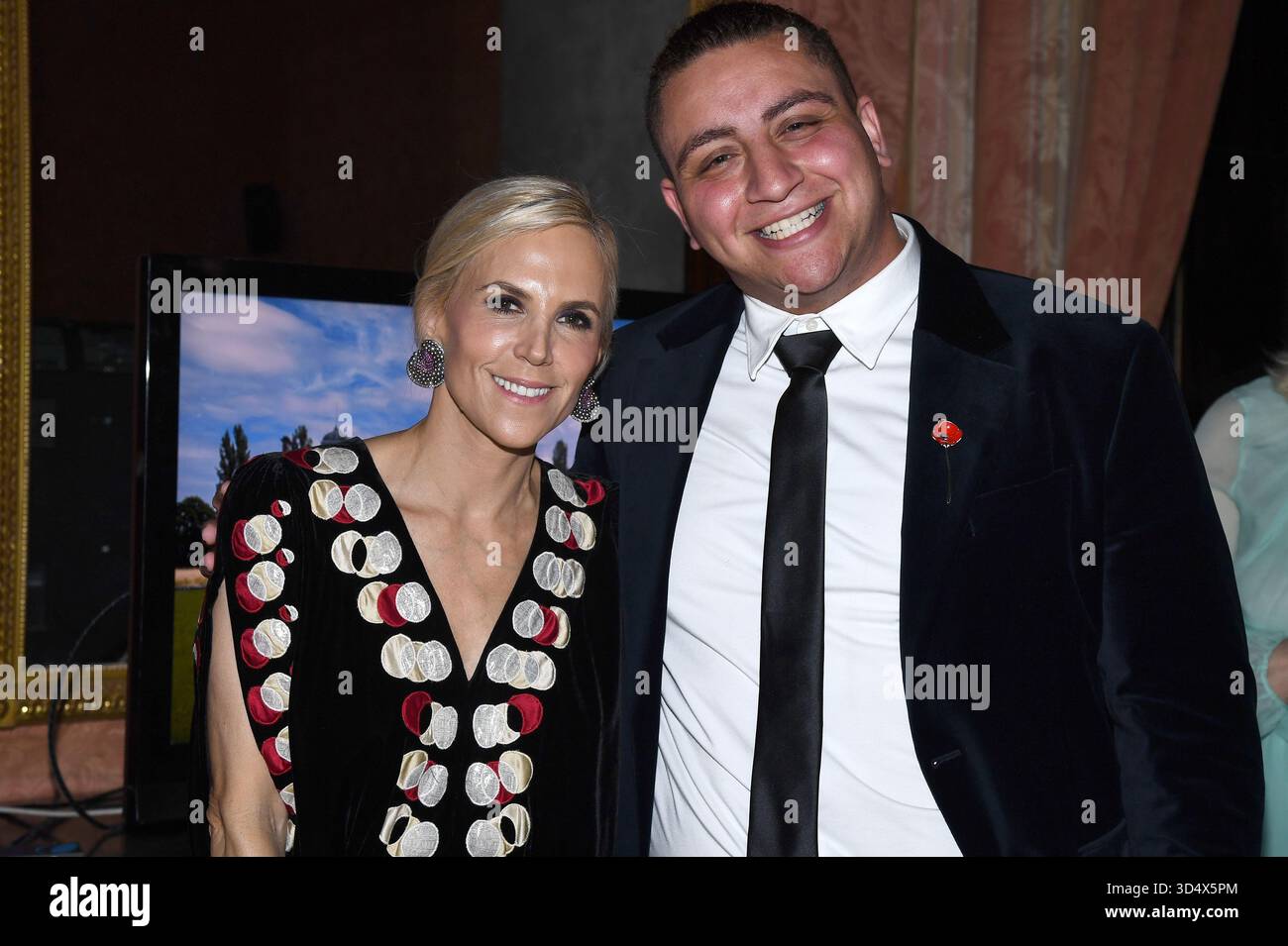 (L-R) Designer Tory Burch poses with singer Filo Ebid during the ...