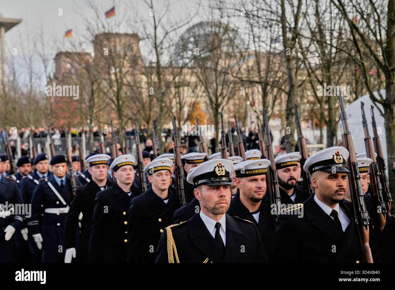Soldiers take part in the ceremonial pledge as a central event to mark ...