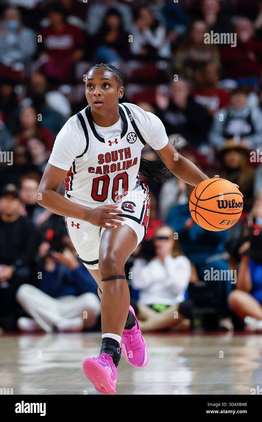 South Carolina guard Ta'Niya Latson pushes the ball upcourt during the first half of an NCAA ...