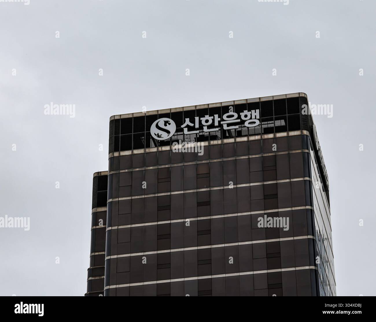 SEOUL, SOUTH KOREA - OCTOBER 11, 2025 - Shinhan Bank logo identifying ...