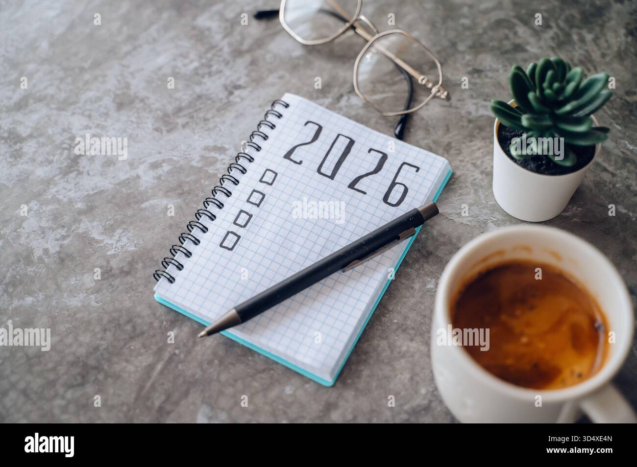 New Year 2026 goals and resolution list with laptop and coffee ...
