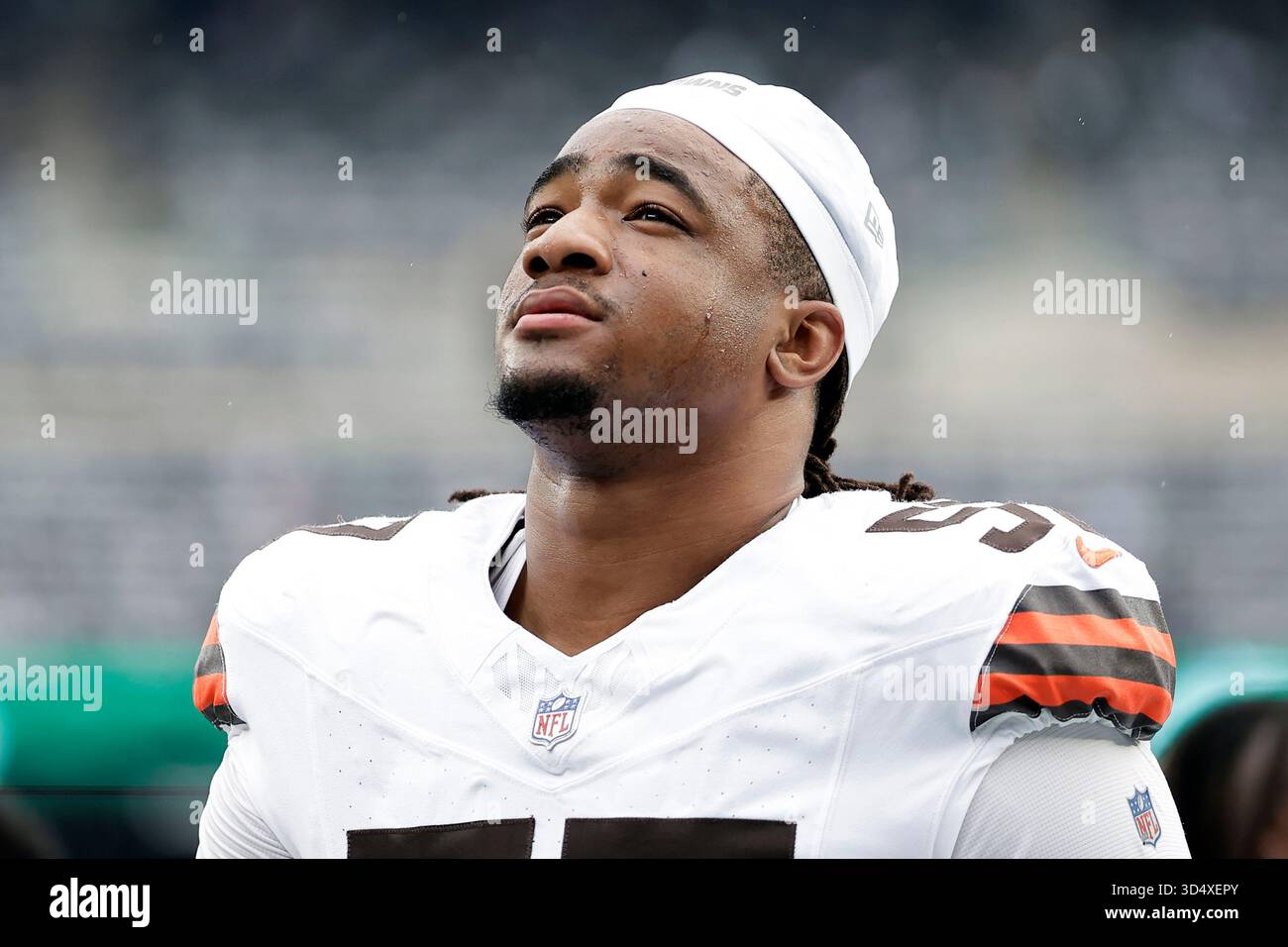 Cleveland Browns defensive end Isaiah McGuire (57) warms up before an ...