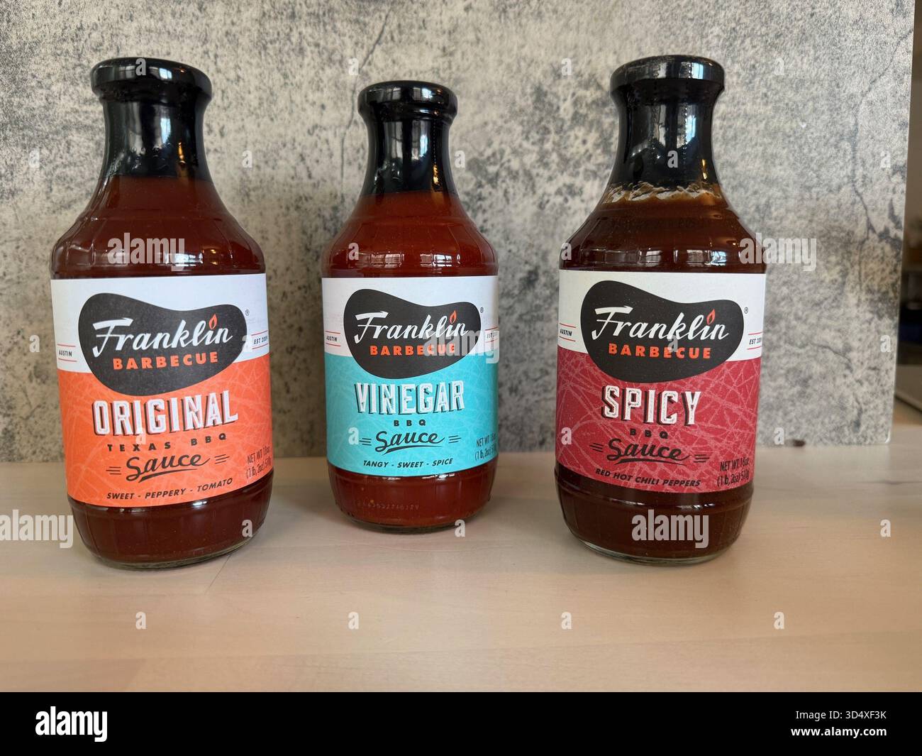 Bottles of Franklin BBQ sauces from Austin, Texas, are displayed in New ...