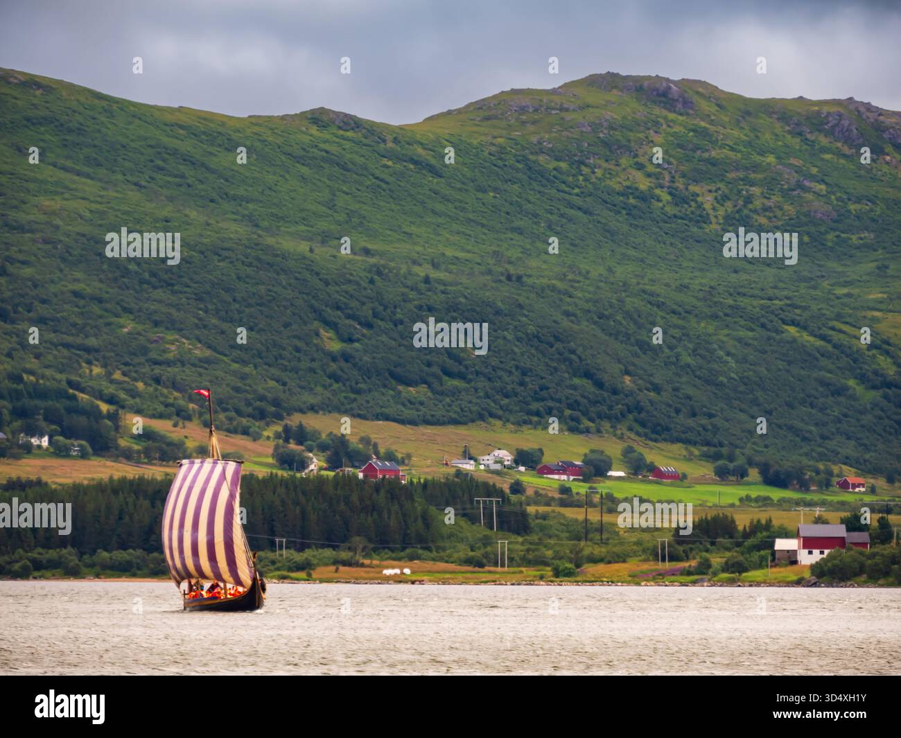 Bøstad, Norway - August 3, 2023: Viking ship sailing on Innerpollen bay ...