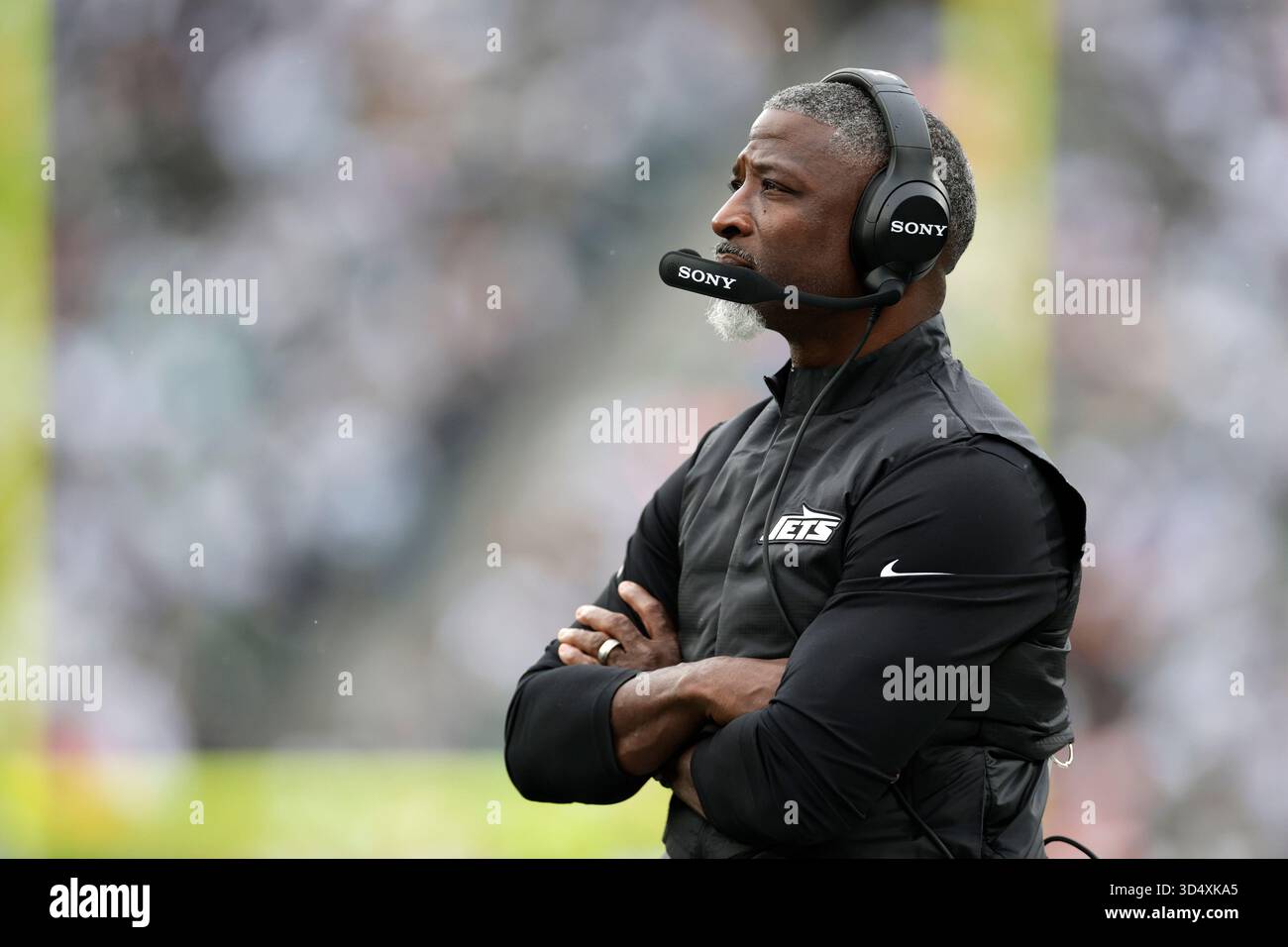 New York Jets head coach Aaron Glenn looks on during an NFL football ...