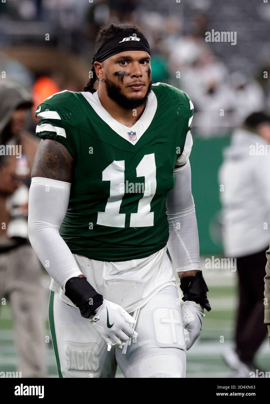 New York Jets linebacker Jermaine Johnson (11) after an NFL football ...