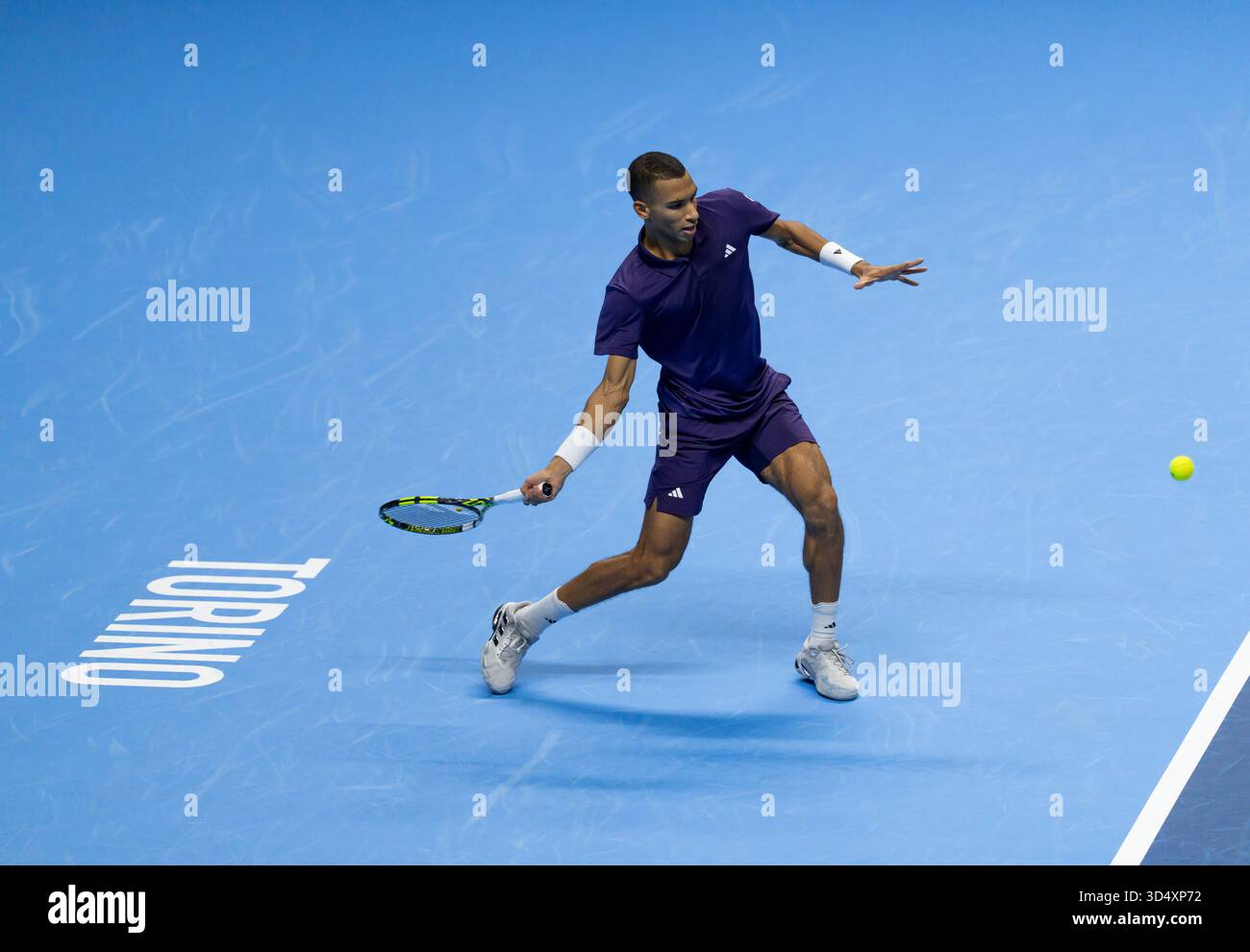Felix Auger-Aliassime in action during his match against Ben Shelton on day four of the Nitto ...