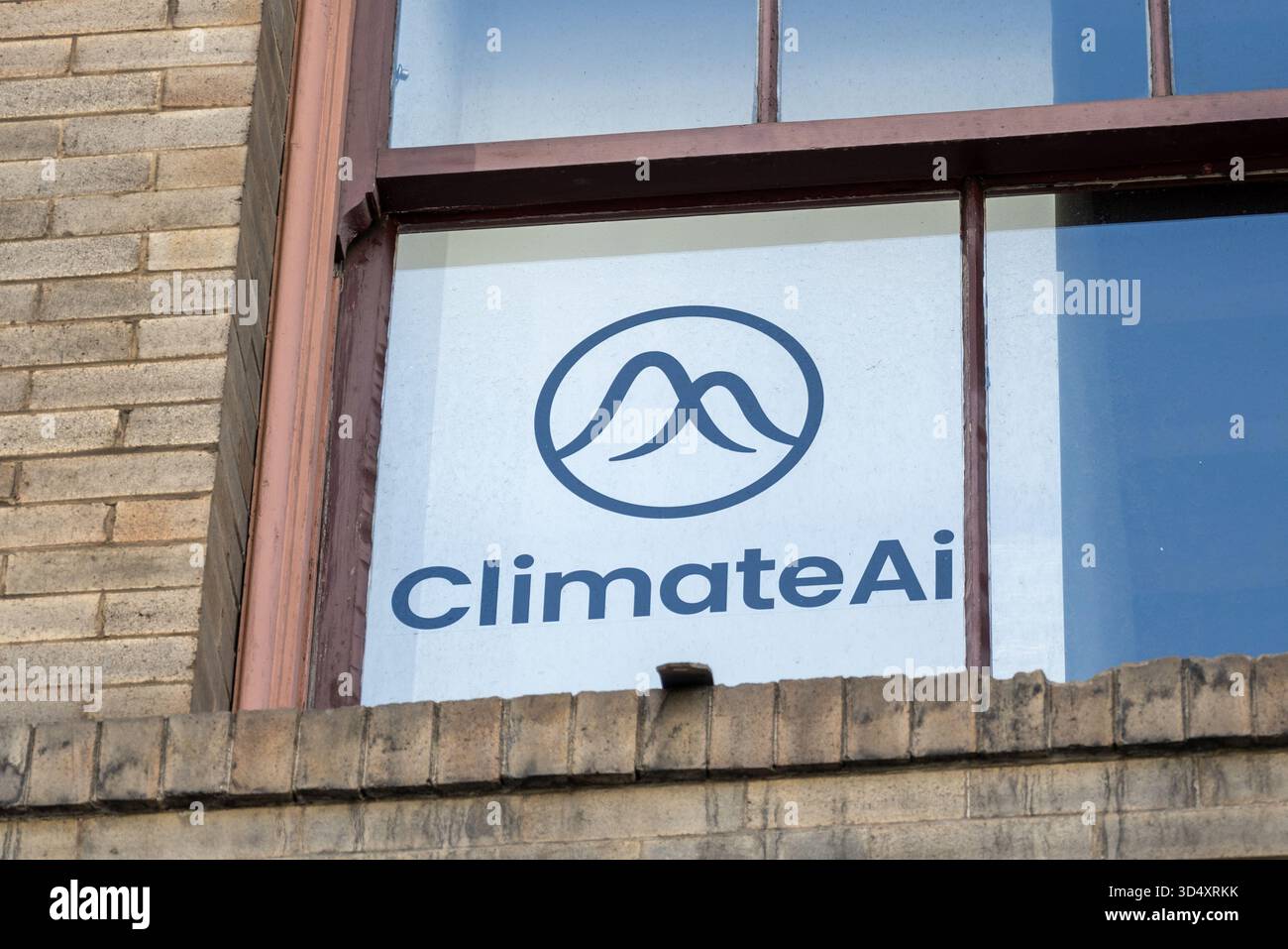 ClimateAi logo displayed in second-story window of brick commercial ...