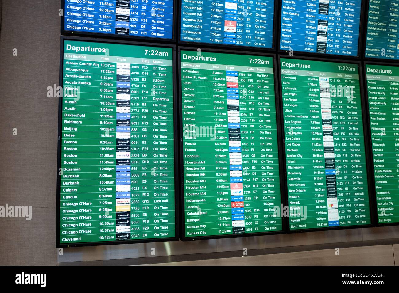Flight status board at San Francisco International Airport (SFO), San ...