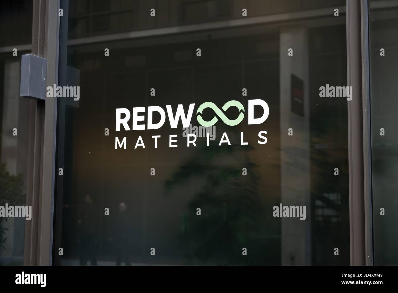 Close-up of Redwood Materials signage on glass window at office ...