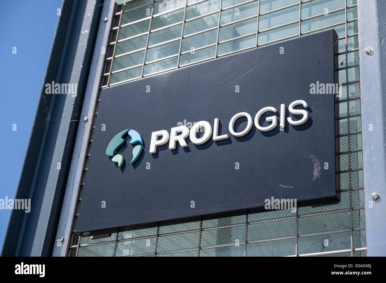 Close-up of Prologis logo on metal sign outside building on sunny day ...
