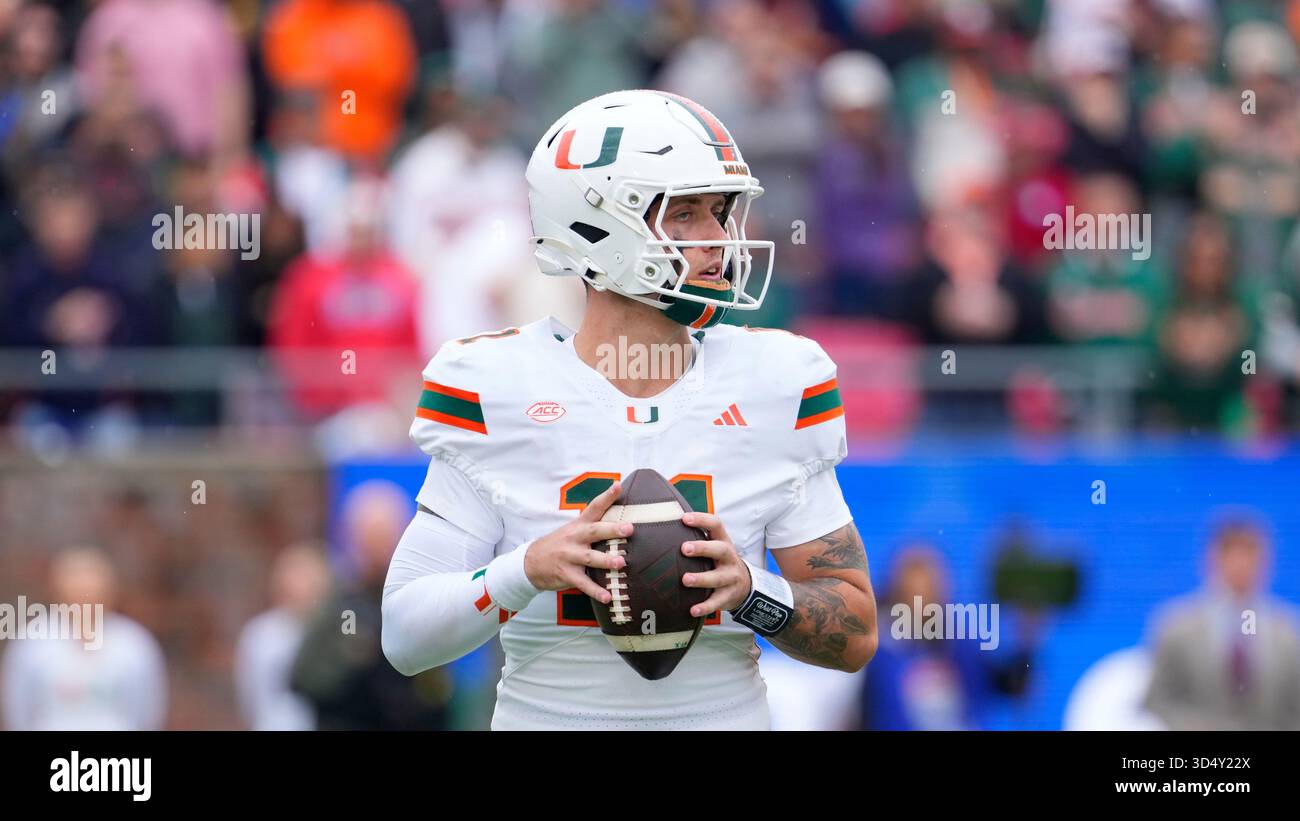 Miami quarterback Carson Beck drops back to pass during an NCAA college ...
