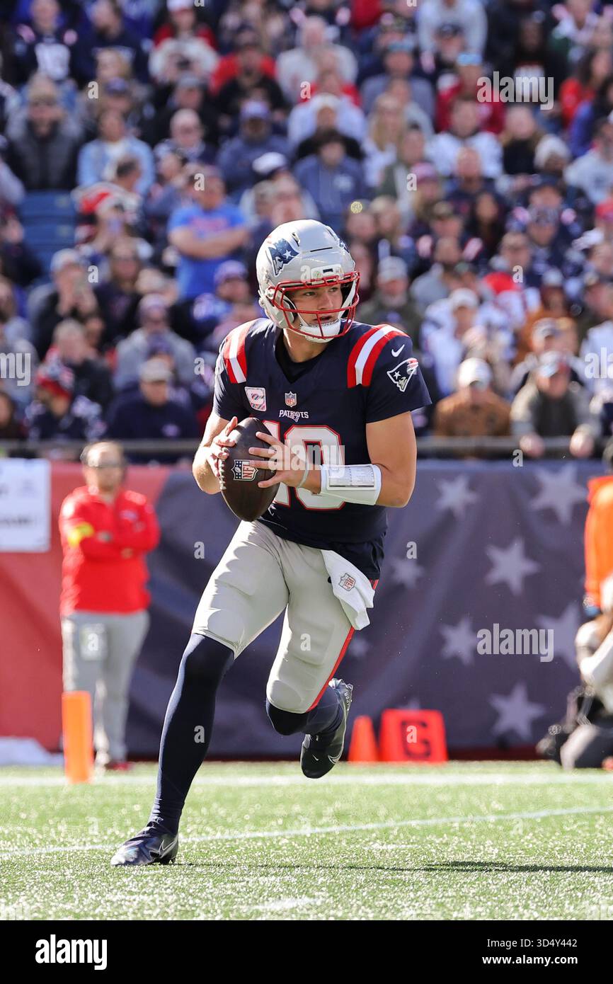 New England Patriots quarterback Drake Maye rolls out against the ...