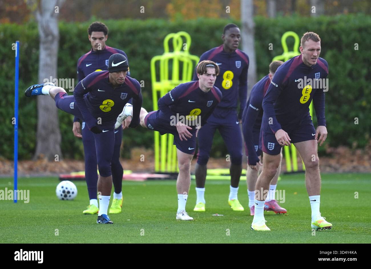 England's Jude Bellingham (left, wearing hat) and team-mates during a ...