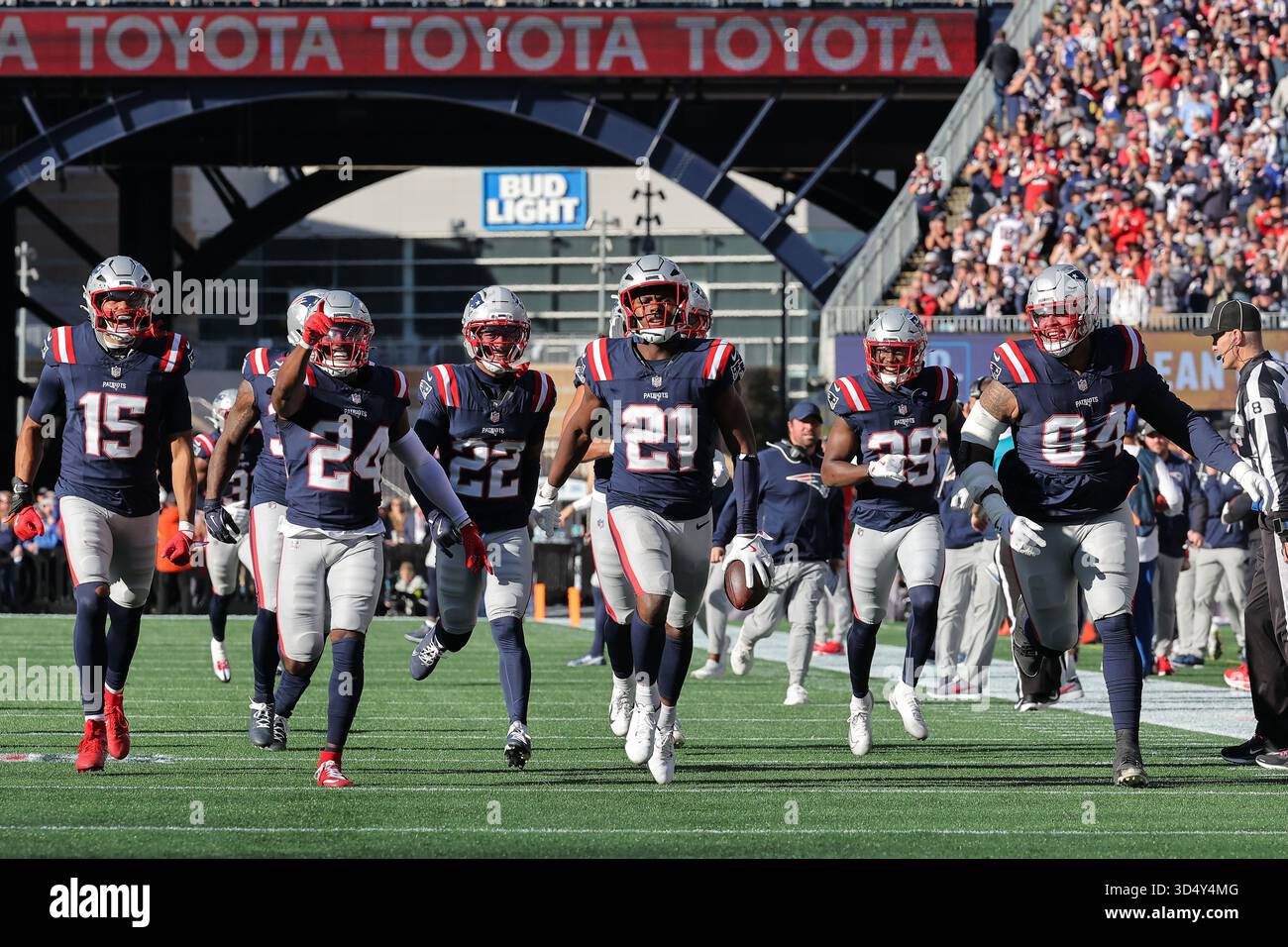New England Patriots' Jaylinn Hawkins runs downfield celebrating his ...