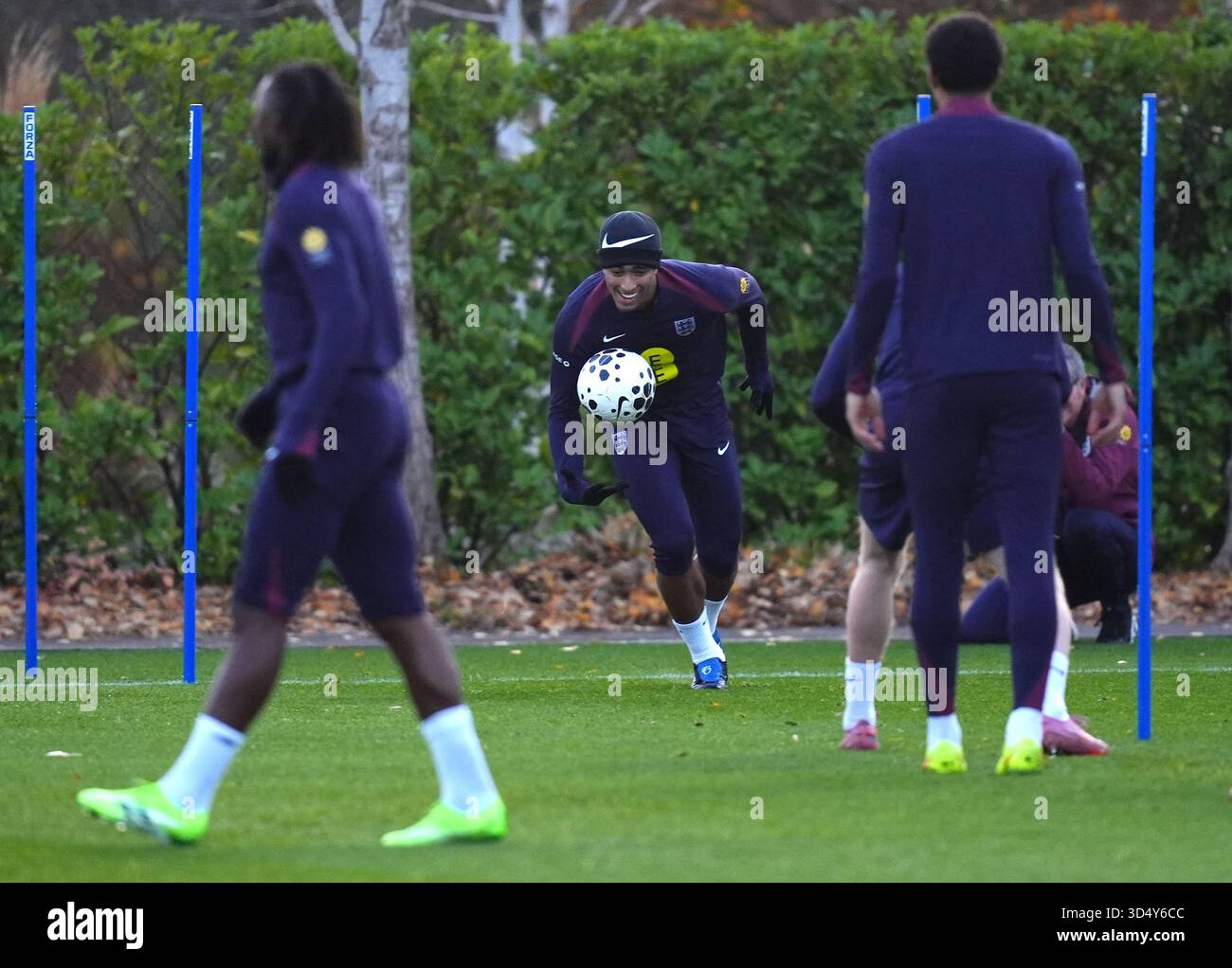 England's Jude Bellingham (centre) and team-mates during a training ...