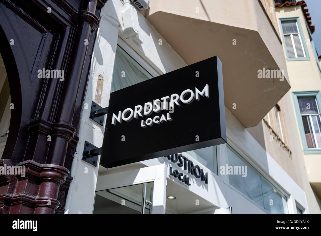 Nordstrom Local blade sign on exterior of retail storefront with ...