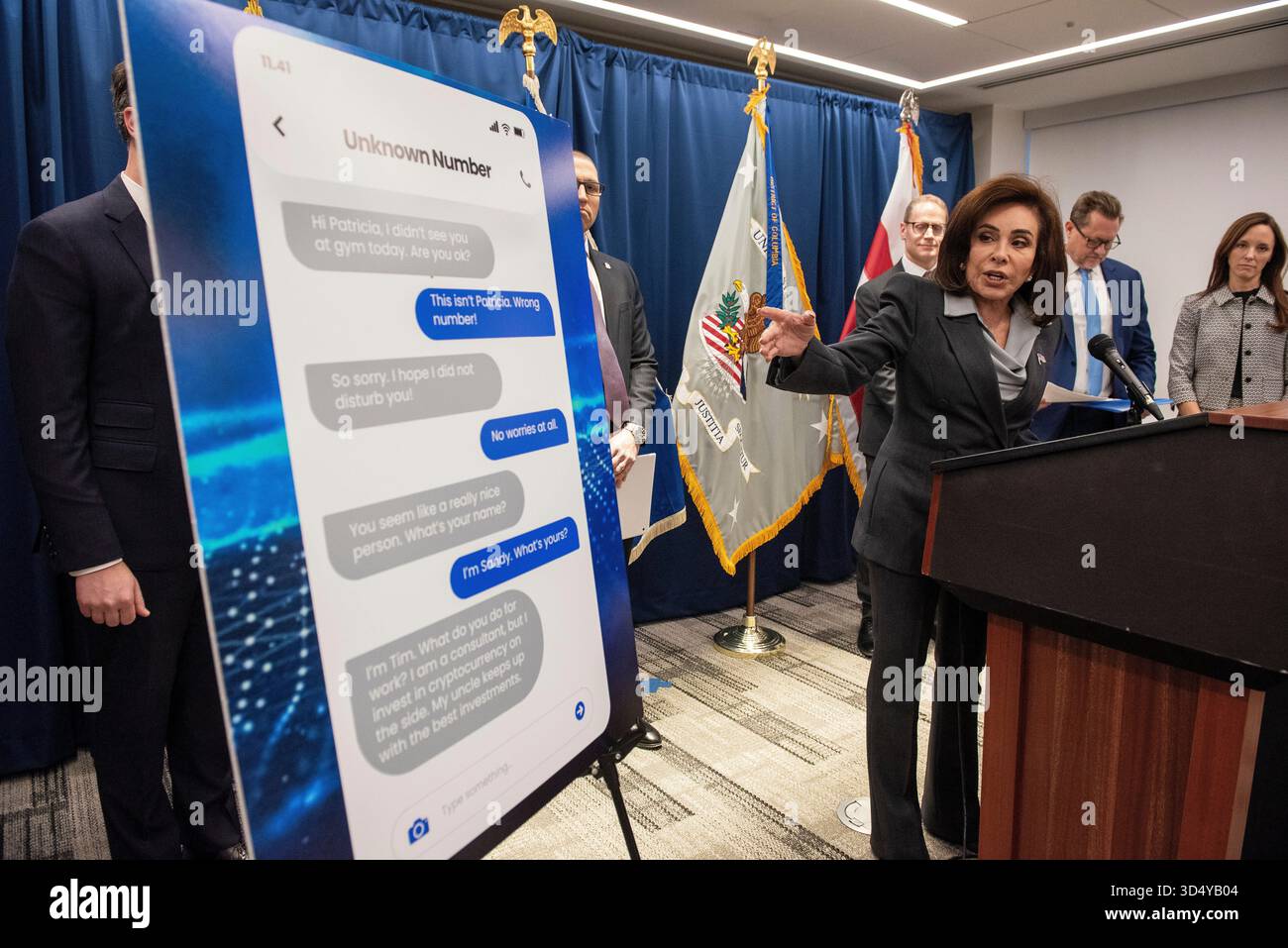 U.S. Attorney Jeanine Pirro points to a text message sent by a scammer ...